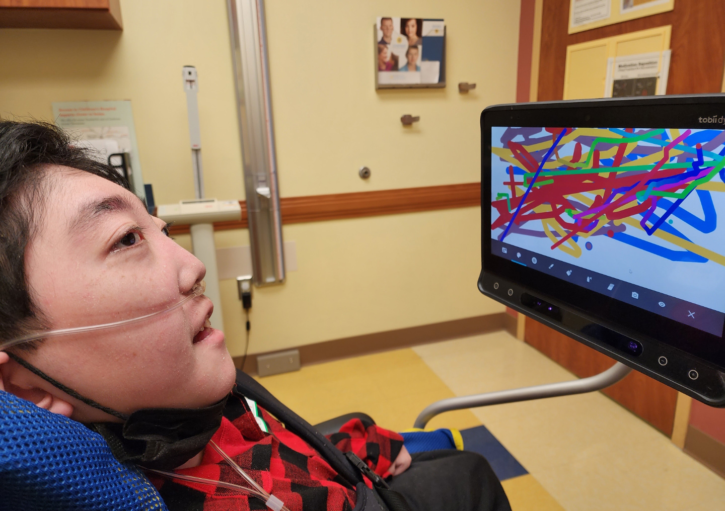 From clinic to comic cons: Team helps nonverbal, nonmobile patient ...